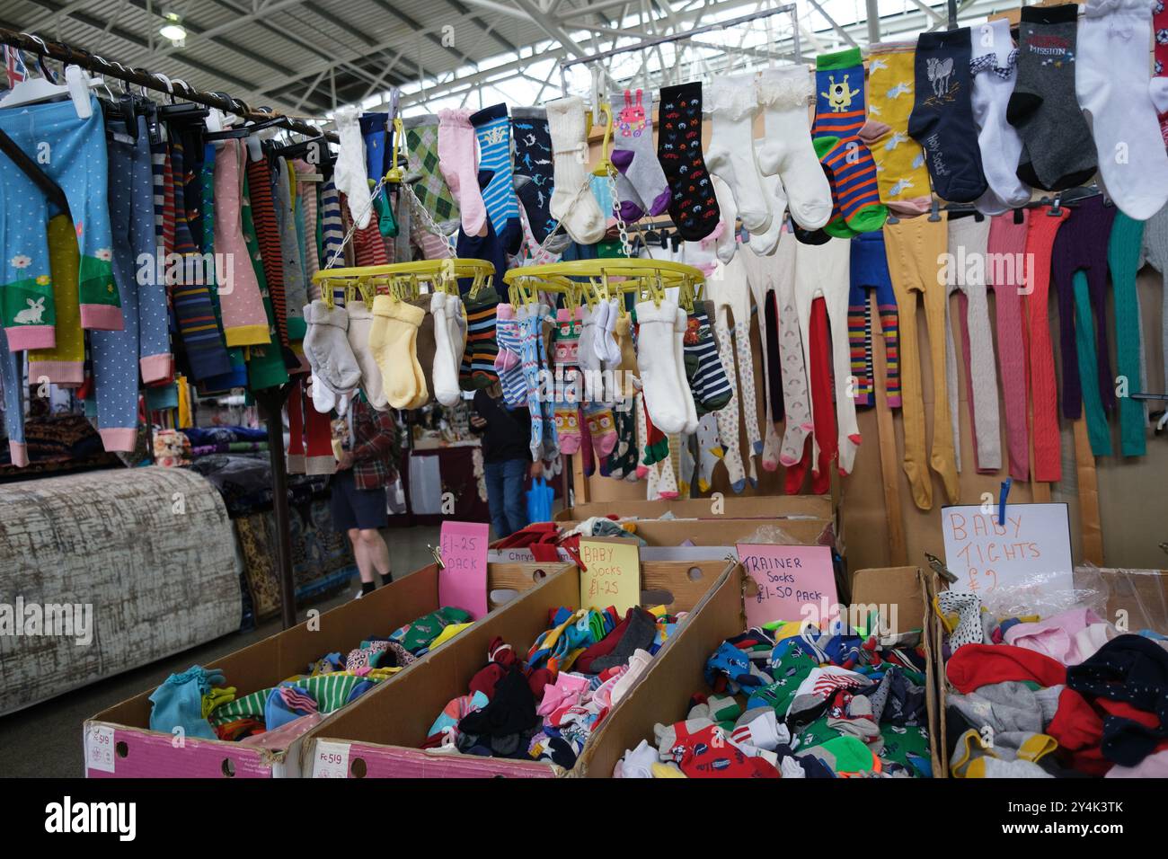View of the stalls at Bullring Rag Market offering all kinds of items ...