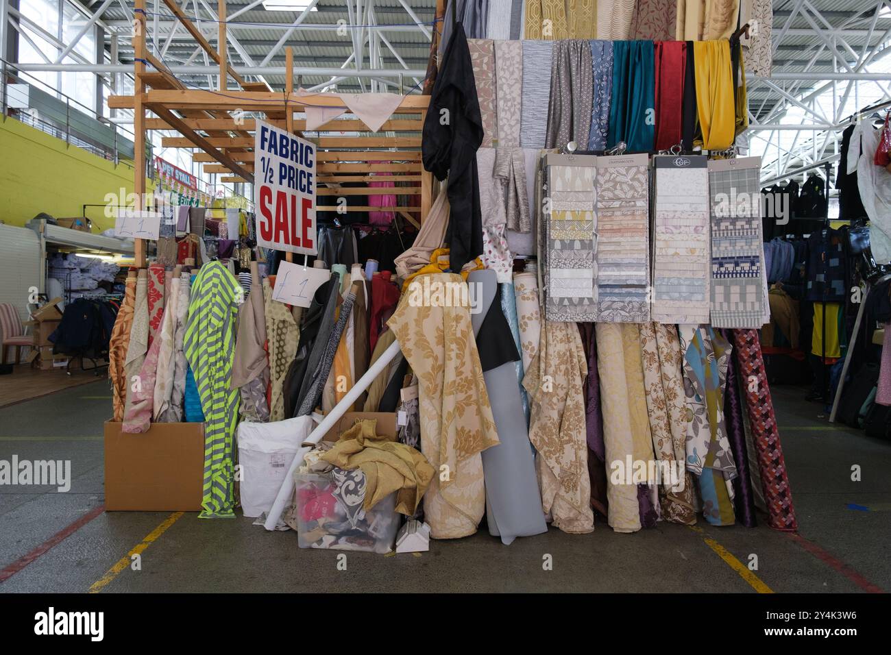 View of the stalls at Bullring Rag Market offering all kinds of items ...