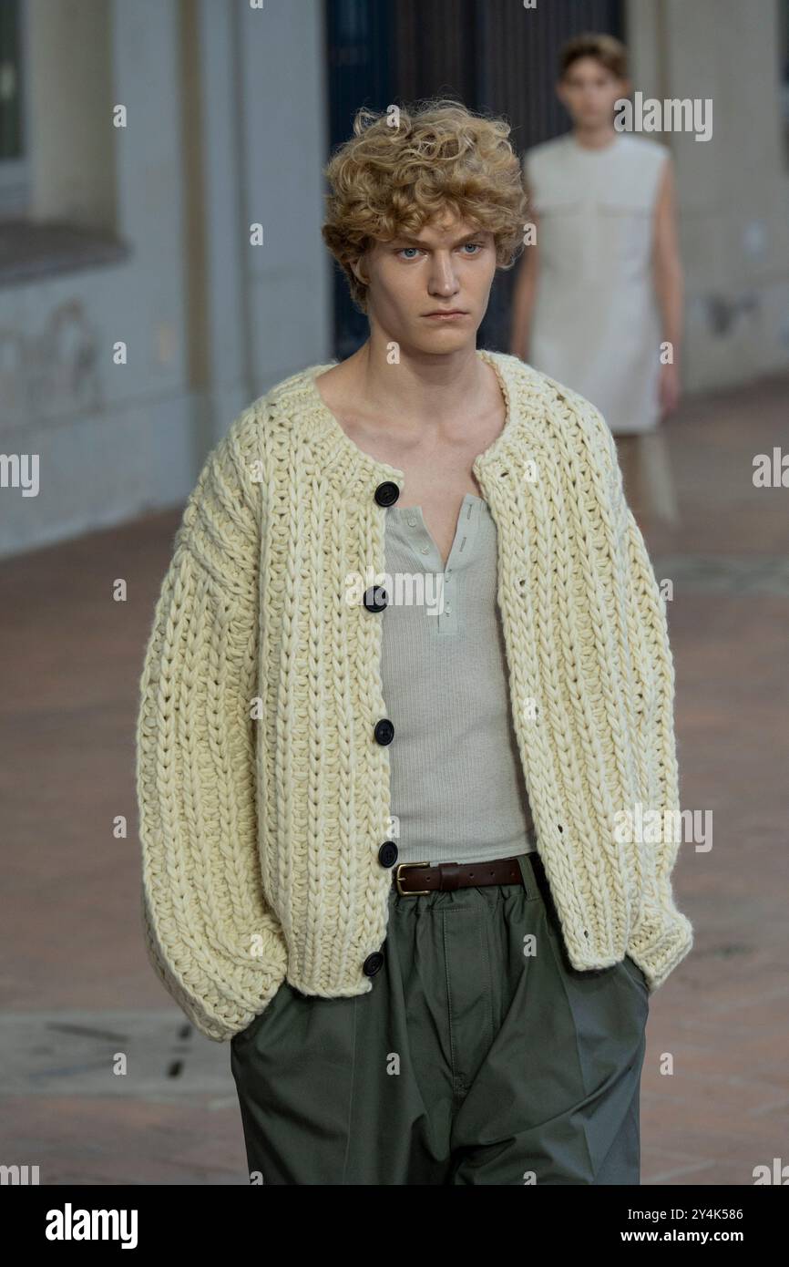 Milan, Italy. 18th Sep, 2024. A model walks the runway at the Onitsuka ...