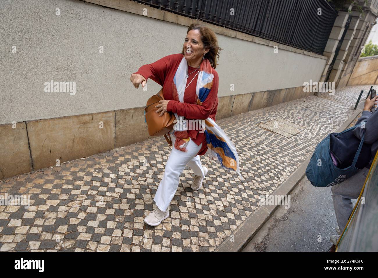 Daily life on the streets of Lisbon, Portugal captured from a window ...