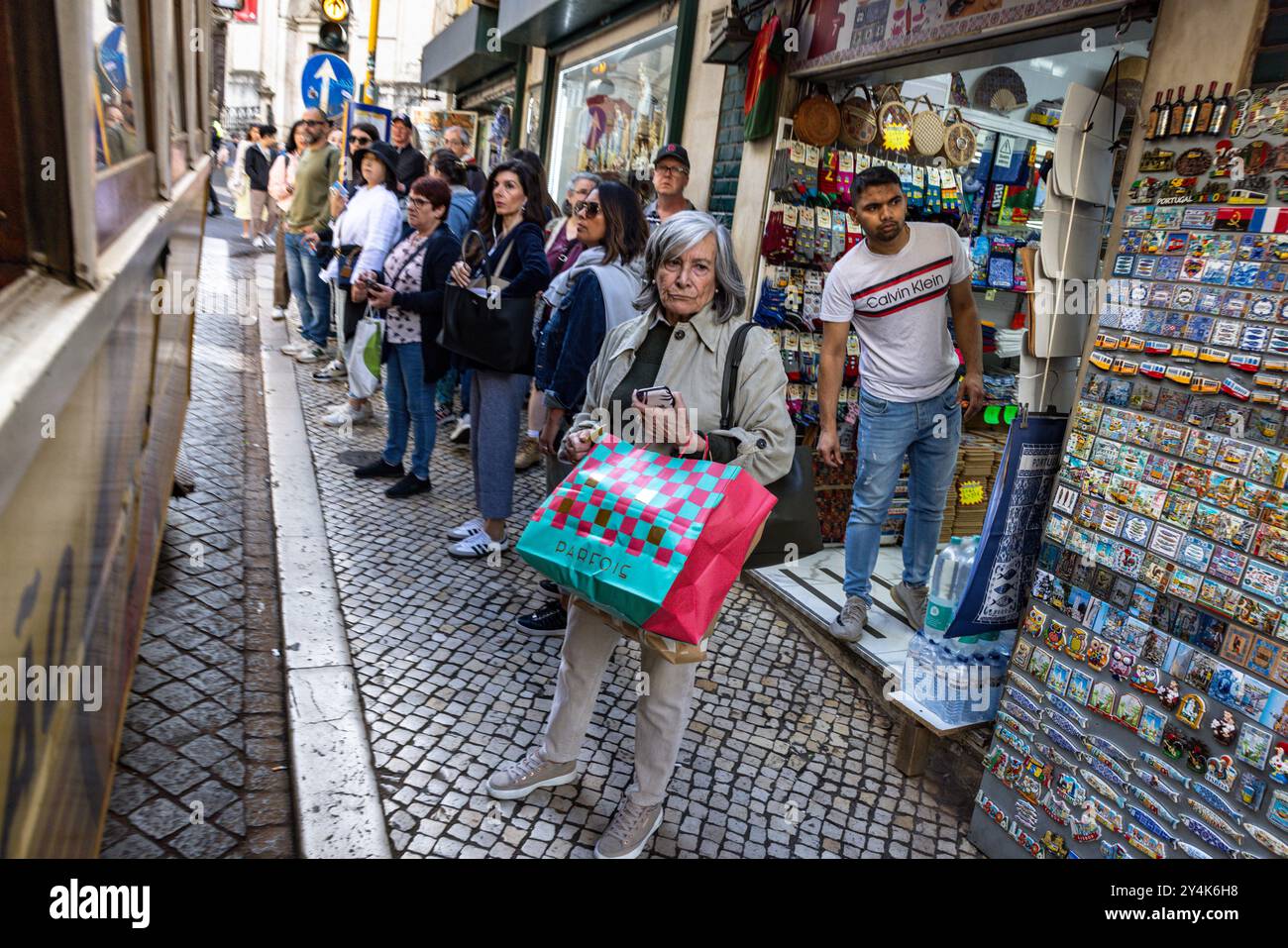 Daily life on the streets of Lisbon, Portugal captured from a window ...