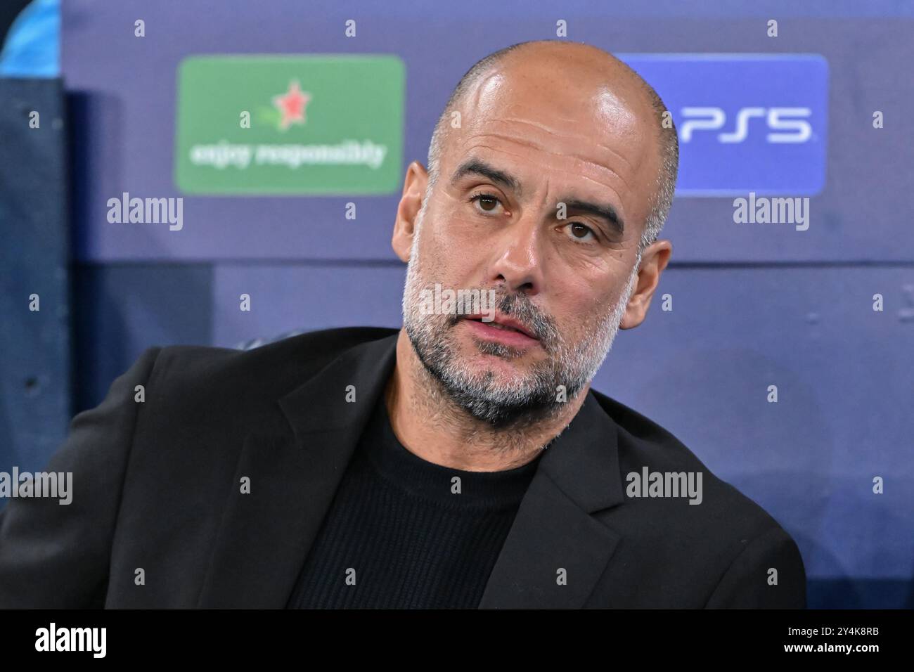 Pep Guardiola manager of Manchester City on the bench ahead of the UEFA ...