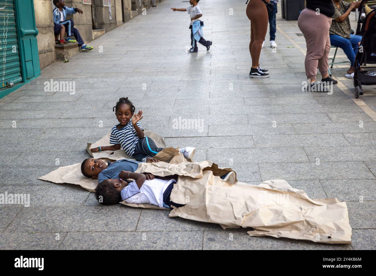 Children playing on a street in Madrid, Spain Stock Photo - Alamy