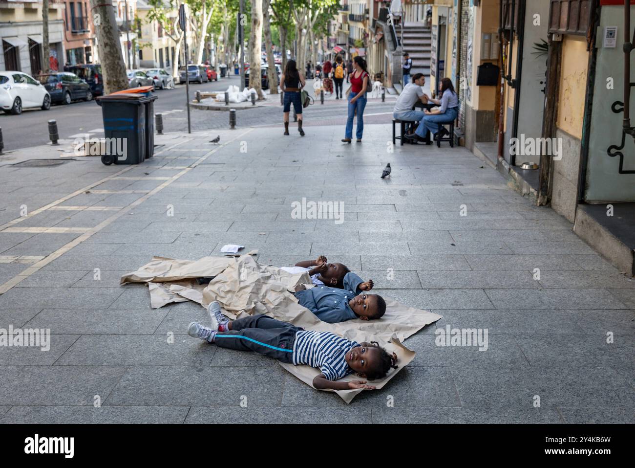 Children playing on a street in Madrid, Spain Stock Photo - Alamy