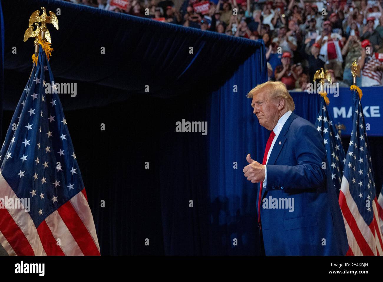 Republican presidential nominee former President Donald Trump gives ...