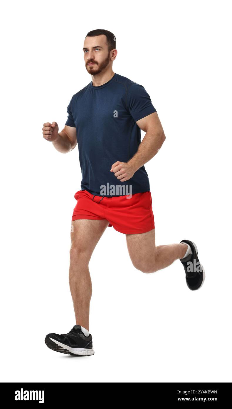 Handsome young man running on white background Stock Photo - Alamy