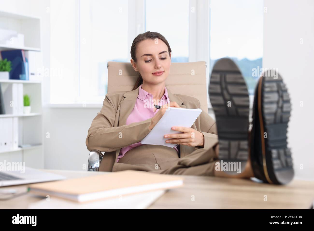 Female secretary legs hi-res stock photography and images - Alamy