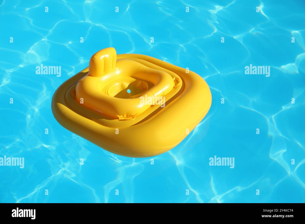 Yellow float in swimming pool at luxury resort Stock Photo - Alamy
