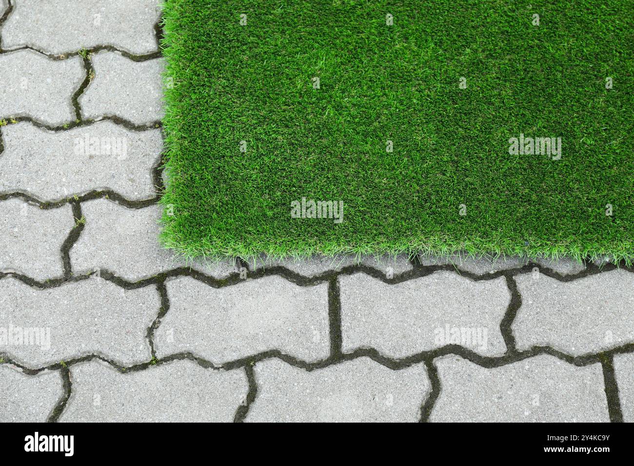 Sheet of green artificial turf in yard, above view Stock Photo - Alamy