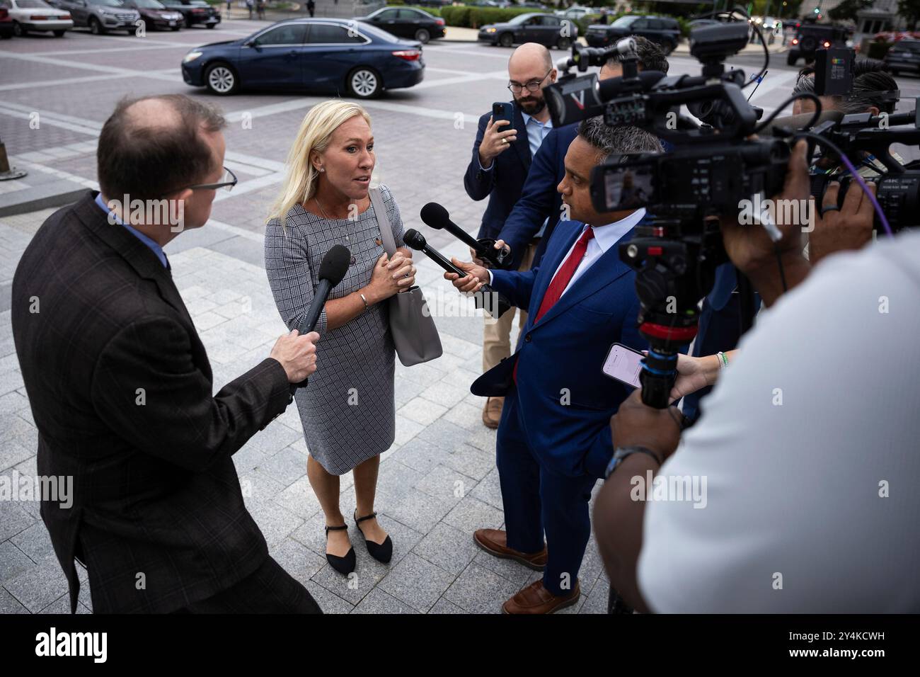 Rep. Marjorie Taylor Greene (R-Ga.) speaks with reporters as she ...