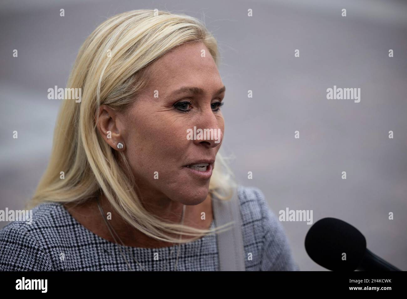 Rep. Marjorie Taylor Greene (R-Ga.) speaks with reporters as she ...
