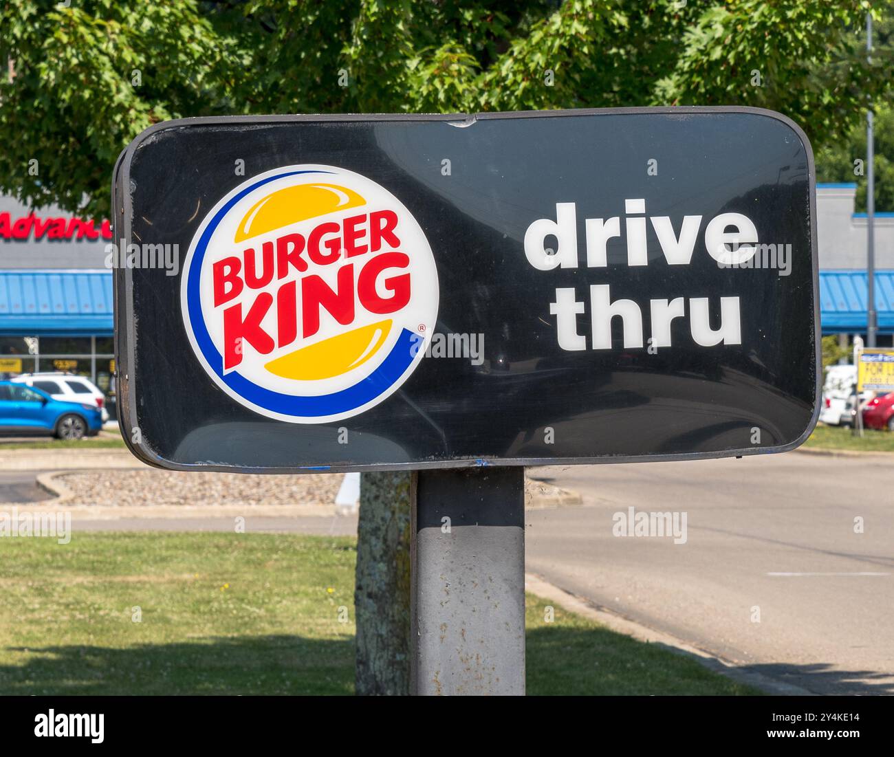 A Burger King drive thru sign in a parking lot in Warren, Pennsylvania ...