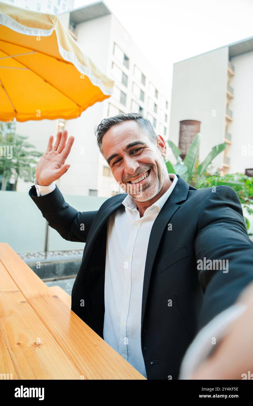 Video mature handsome entrepreneur doing hi-res stock photography and ...