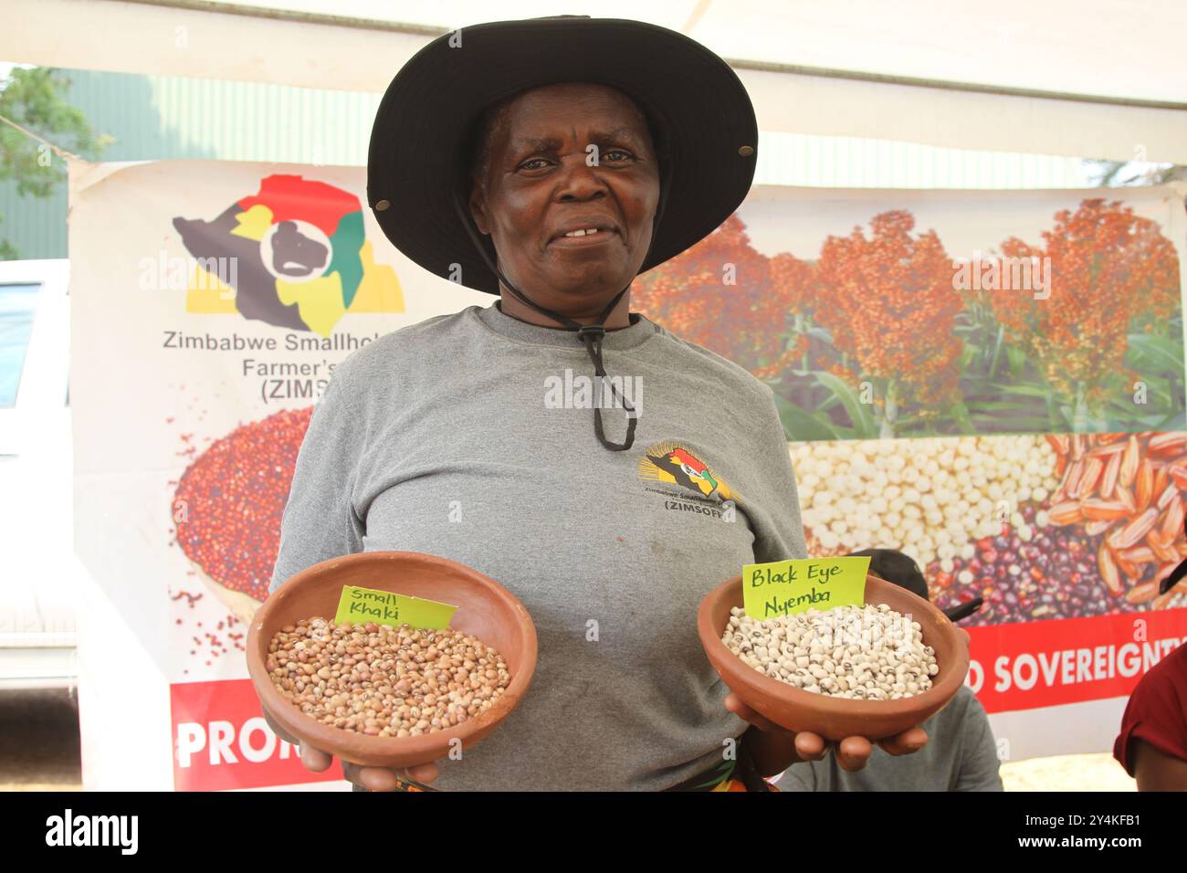 Harare, Zimbabwe. 14th Sep, 2024. A farmer holds clay bowls containing ...