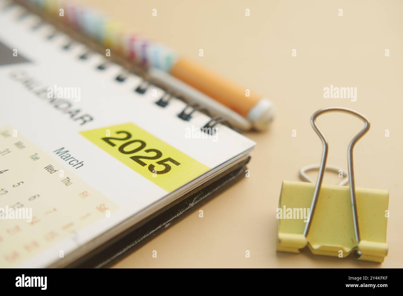 2025 year calendar on office desk Stock Photo - Alamy