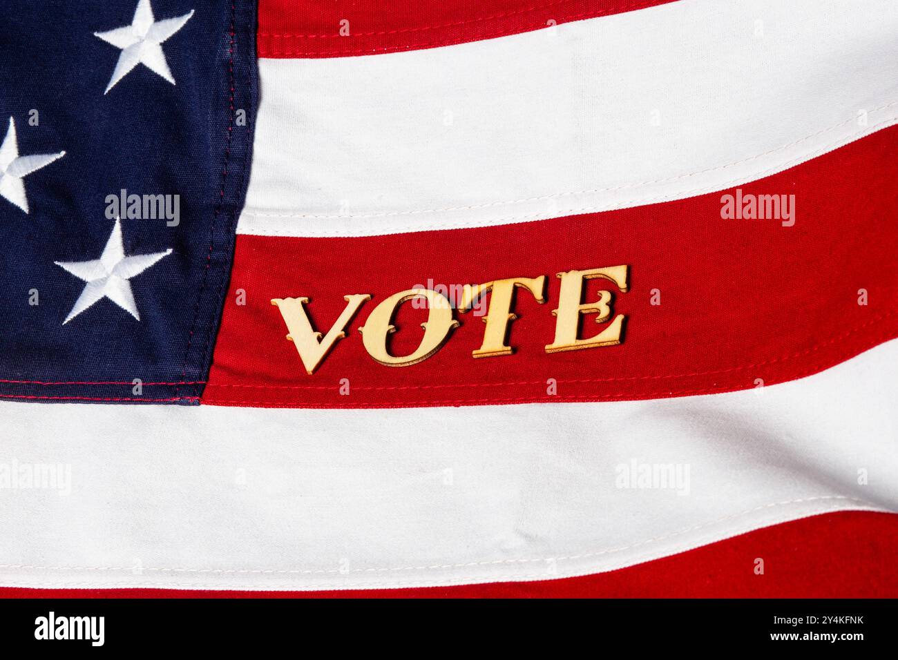 The word vote resting on the USA flag, horizontal Stock Photo - Alamy