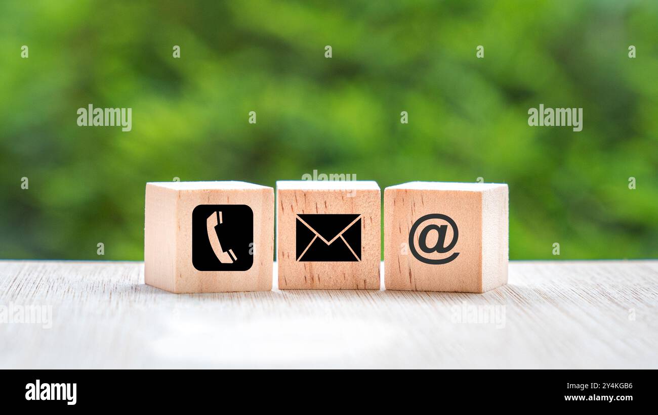 Wood block cube symbol telephone, email, address. Website page contact ...