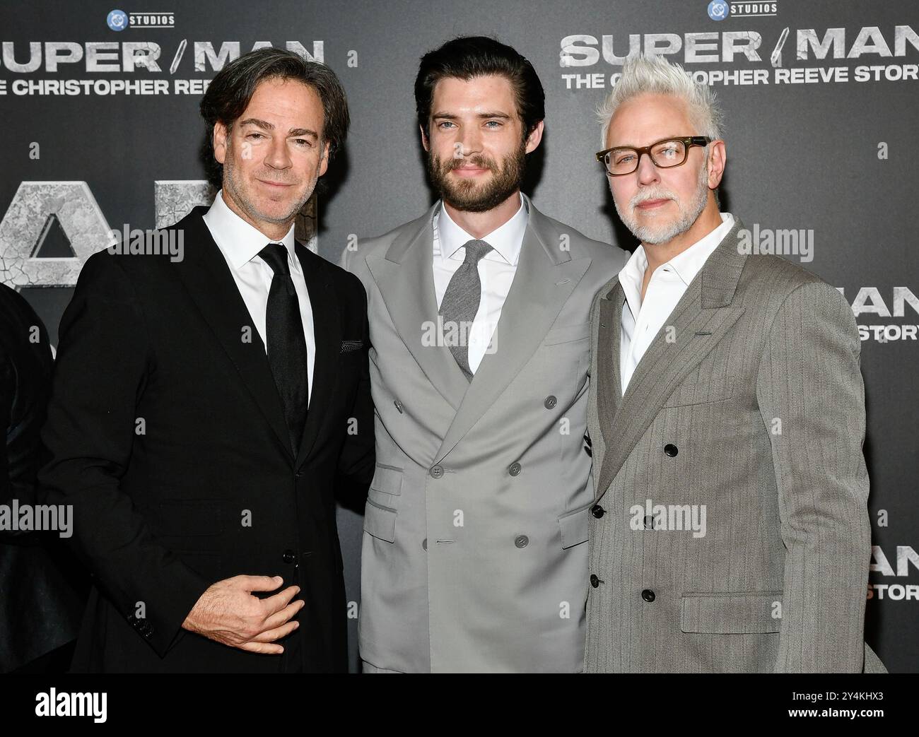 Peter Safran, left, David Corenswet and James Gunn attend the premiere ...