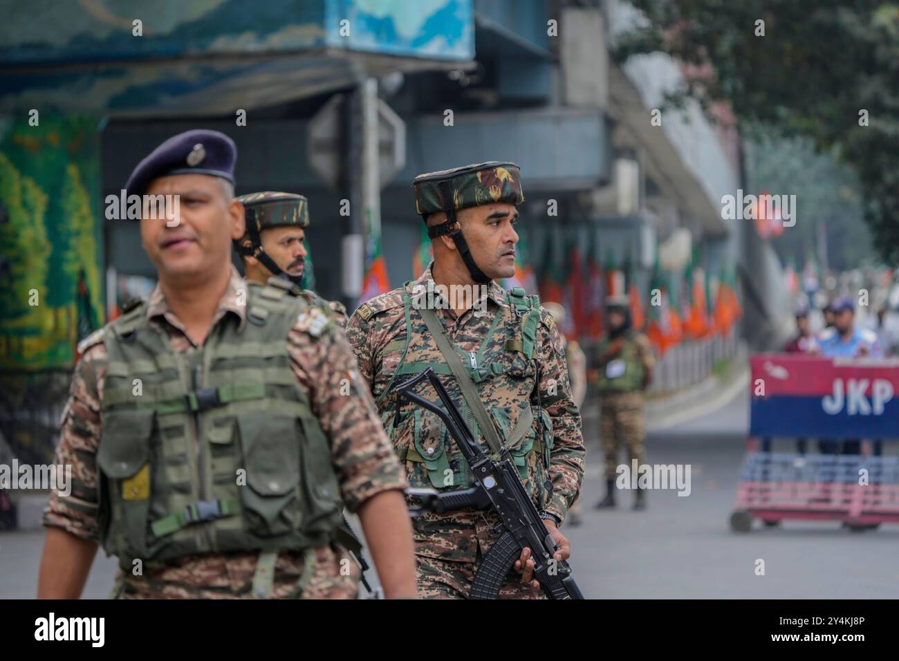 Indian paramilitary soldiers guard at a closed road ahead of Indian ...