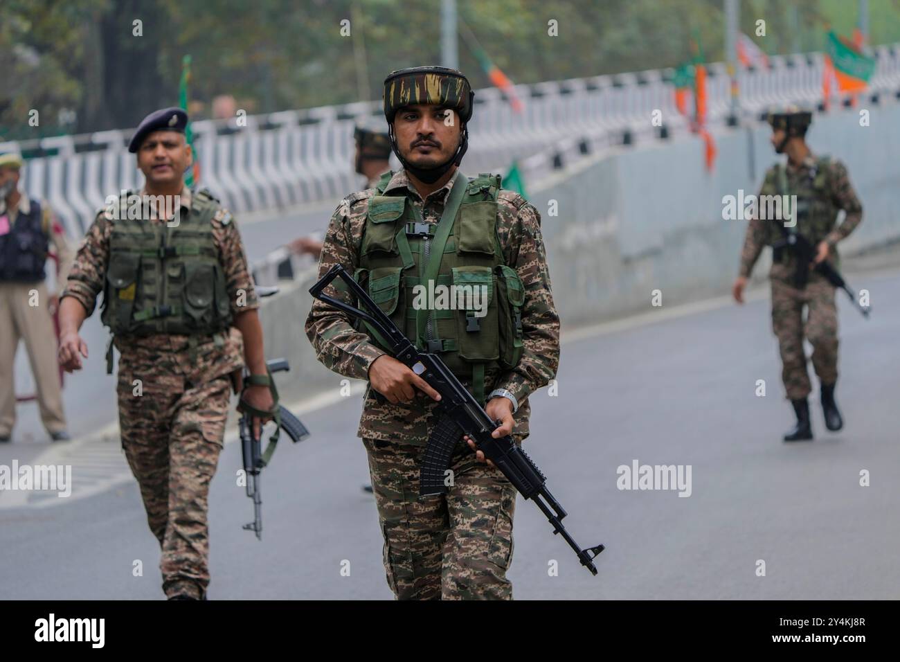 Indian paramilitary soldiers guard at a closed road ahead of Indian ...