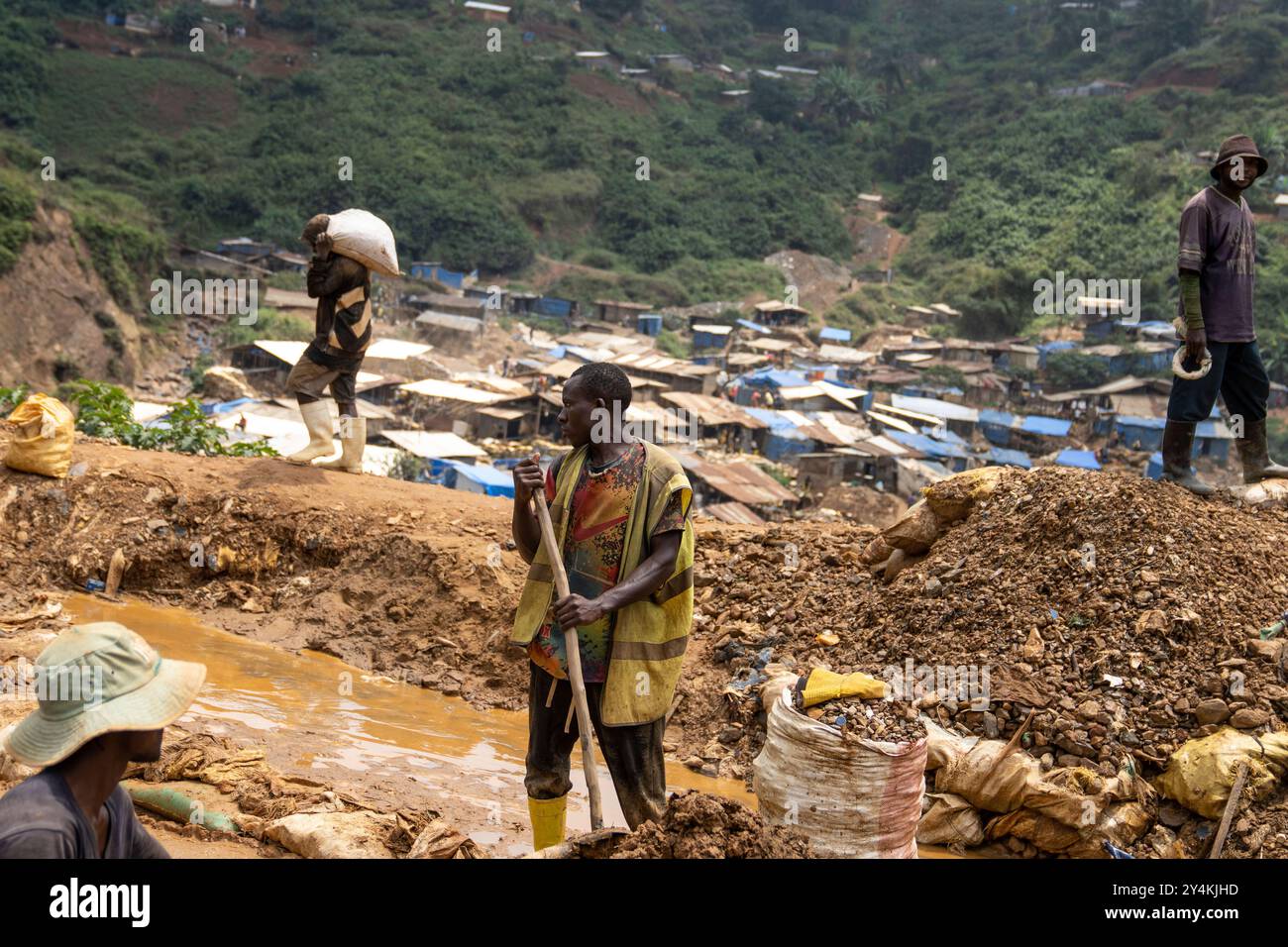 Gold miners at work in the town of Kamituga, in South Kivu province in ...