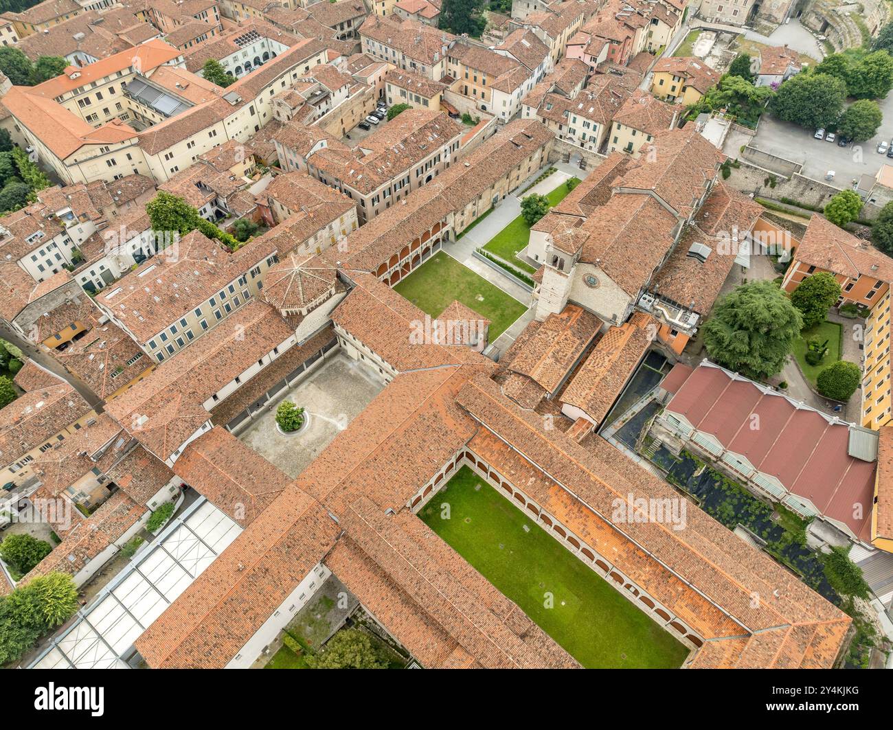 Aerial view of San Salvatore basilica, Roman amphitheater in medieval ...