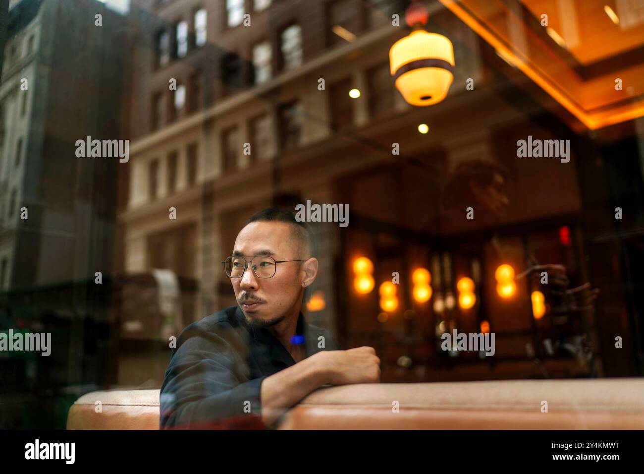 Robert Calabretta sits for a portrait at the restaurant where he works ...