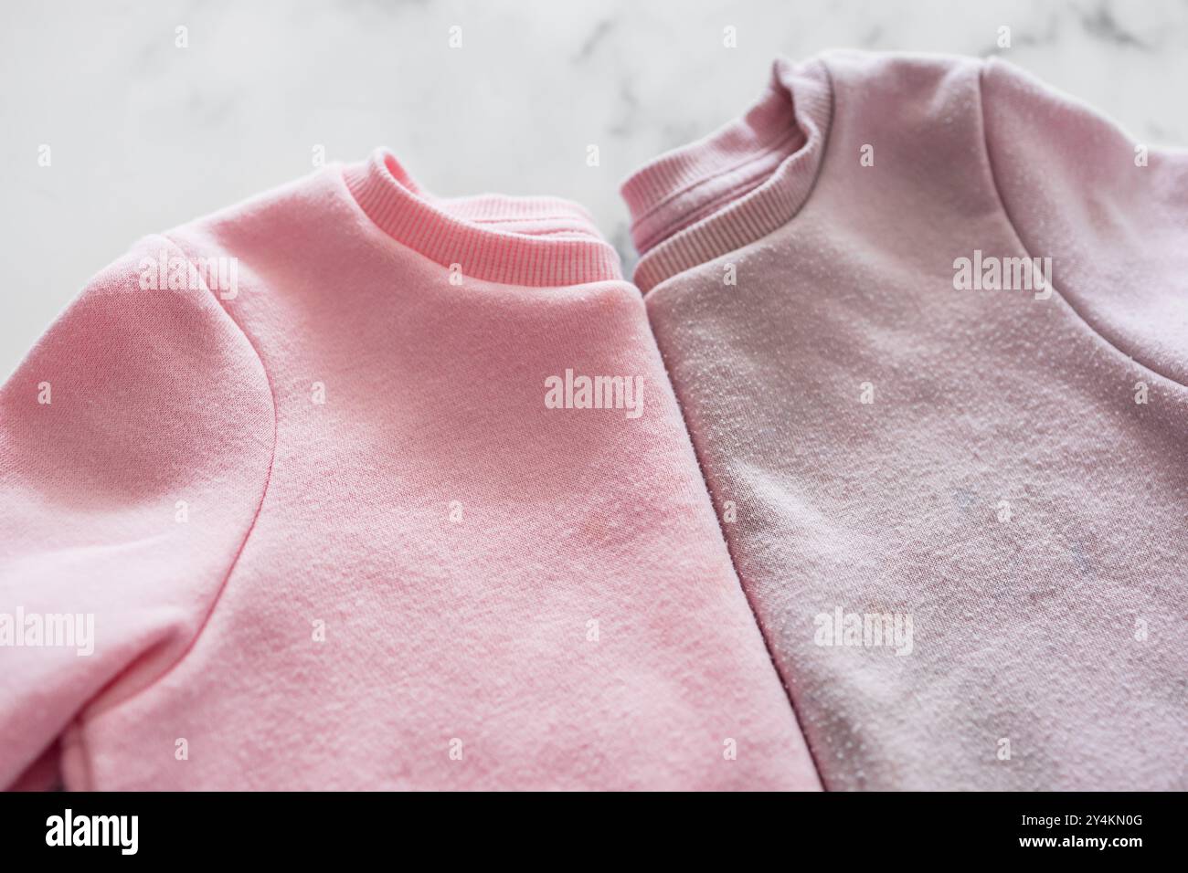 new vs old and used clothes, identical sweaters side by side one being ...