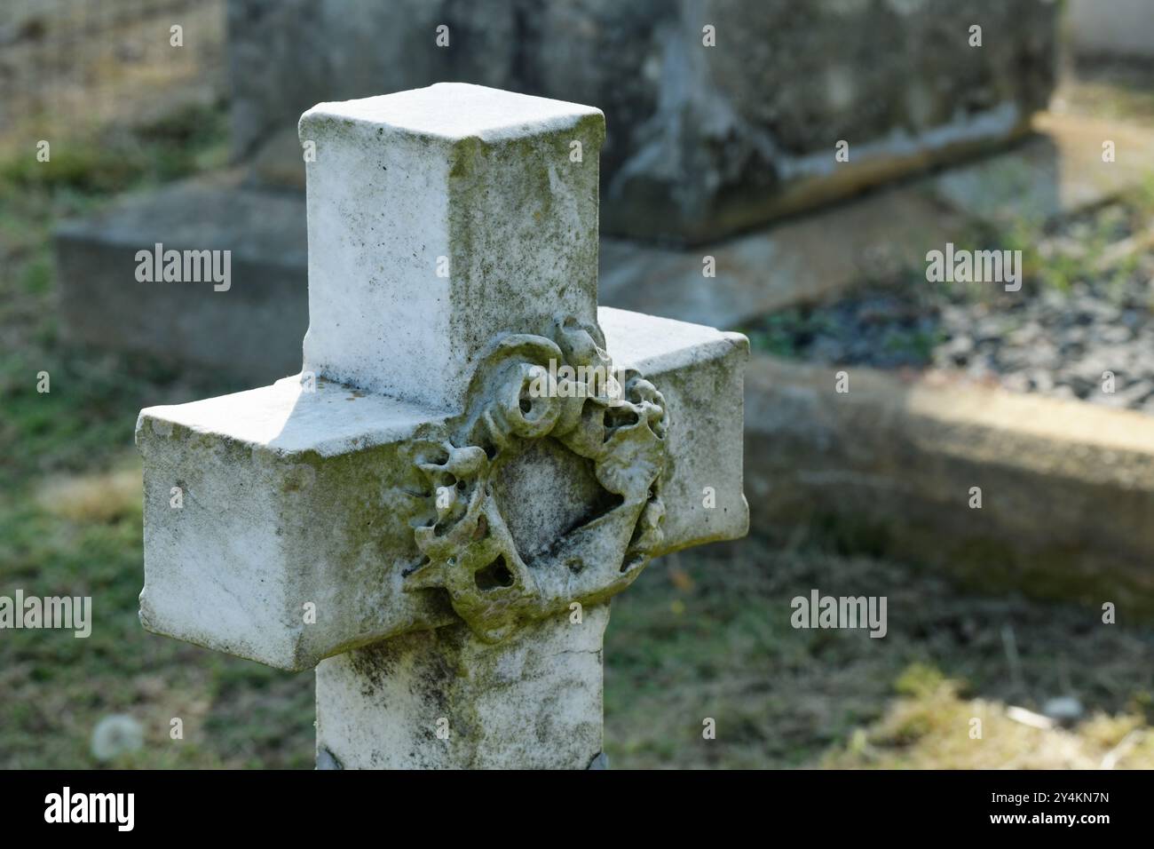 Cross on Christian grave, still life object, tombstone in graveyard ...
