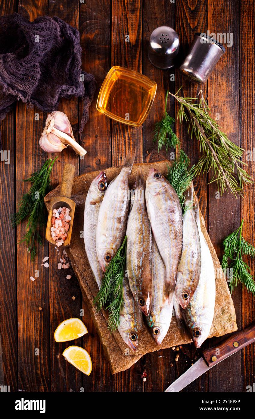 Sea delicacies. Fresh seafood. Fish Grouper on stone board Stock Photo ...
