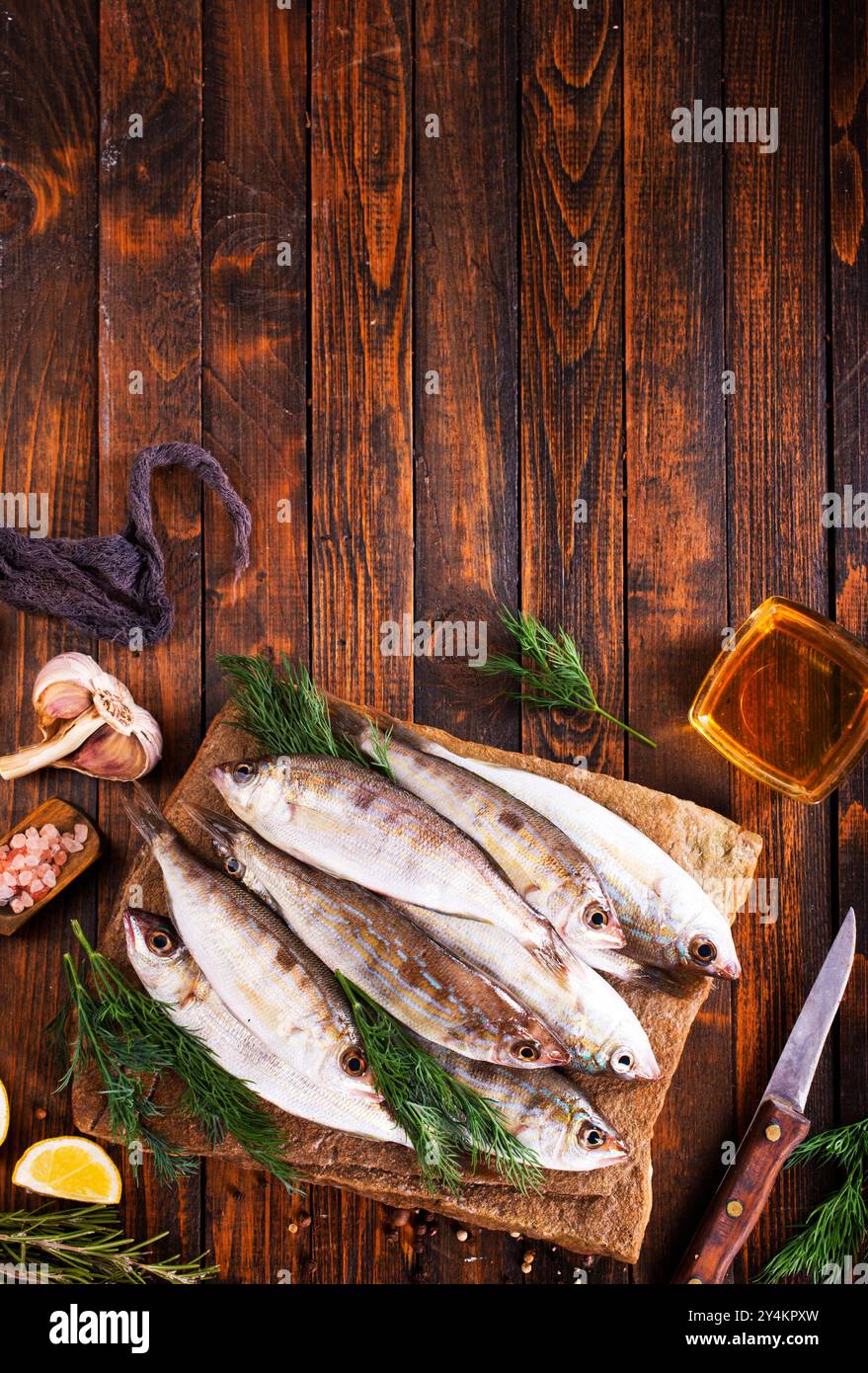 Sea delicacies. Fresh seafood. Fish Grouper on stone board Stock Photo ...