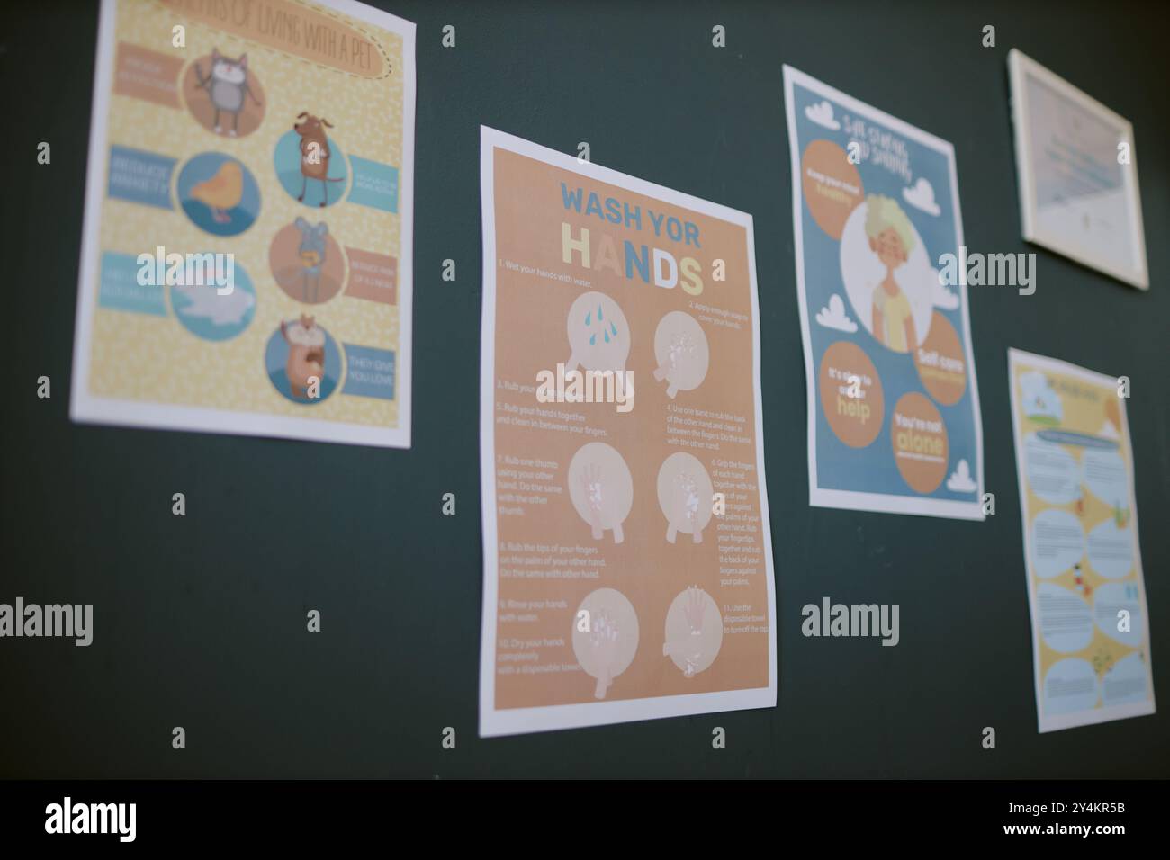 Educational Posters Showing Hand-Washing Procedures on Wall Stock Photo ...