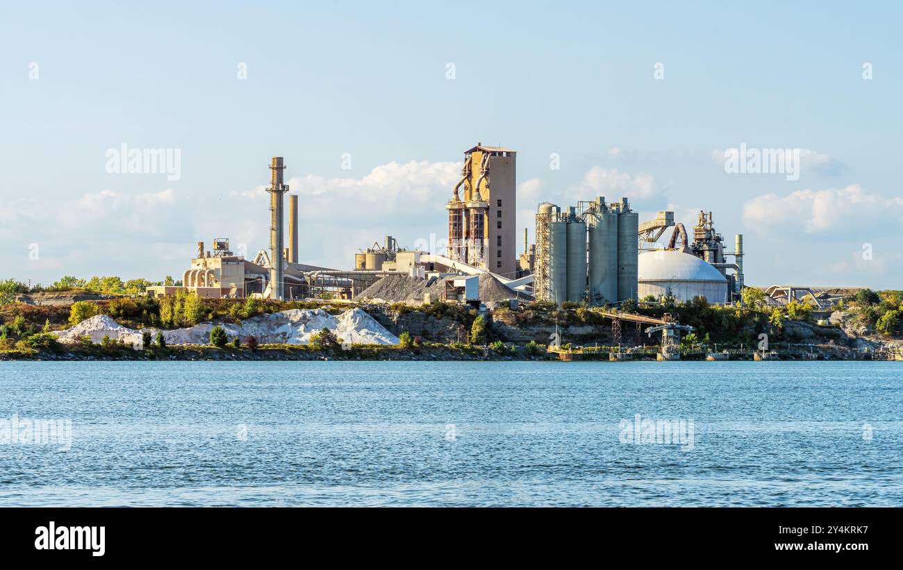 Heidelberg Materials, a cement processing plant is located near the ...