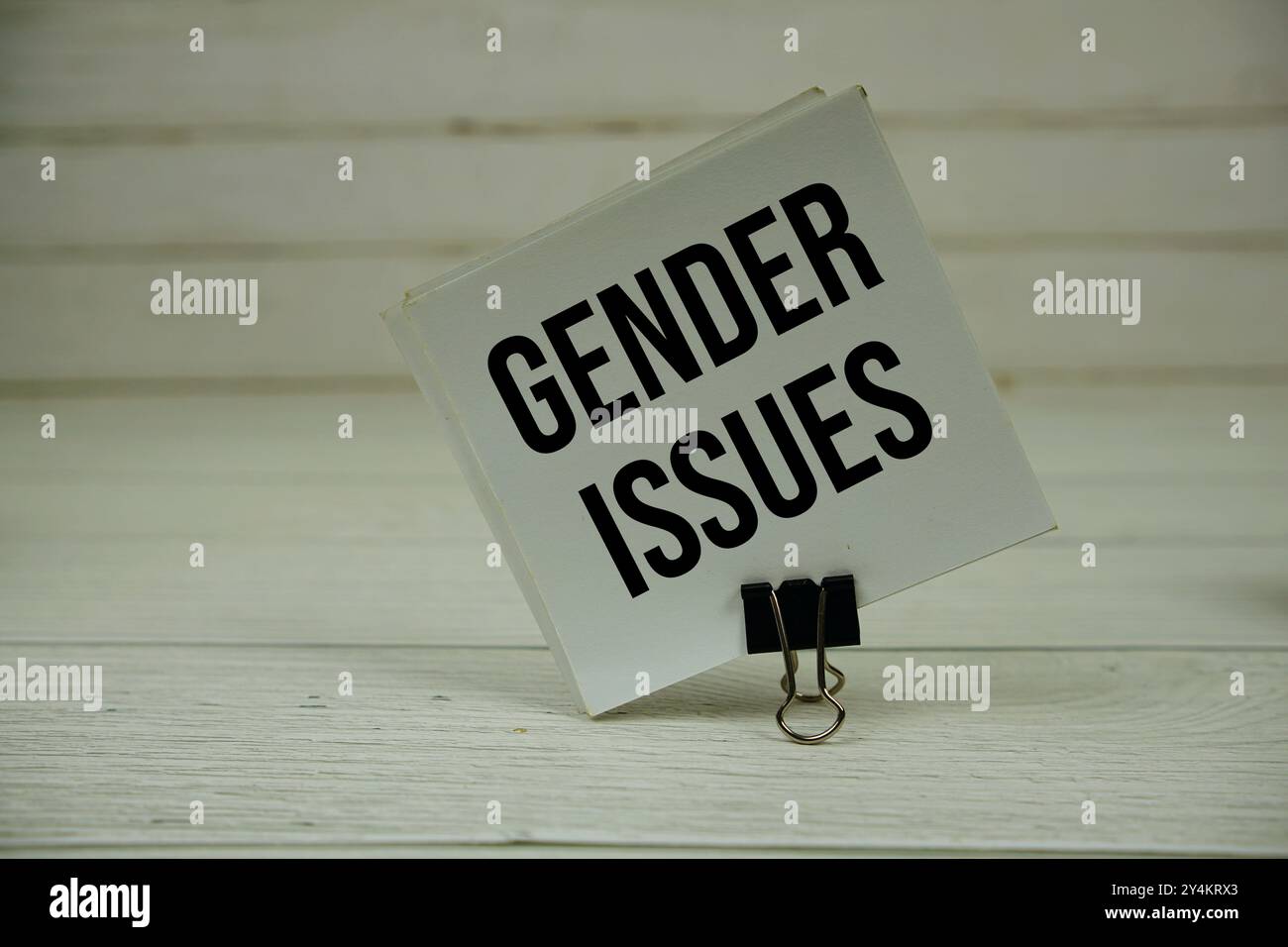 Gender Issues text message write on sticky note on wooden background ...