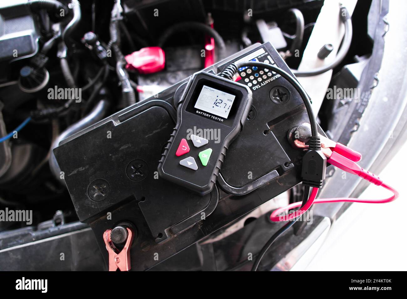 Car battery voltage testing with battery tester , Car battery ...