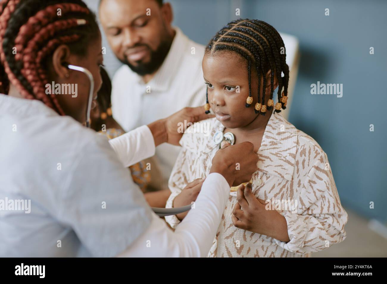 Child Undergoing Medical Checkup by Medical Professional Stock Photo ...