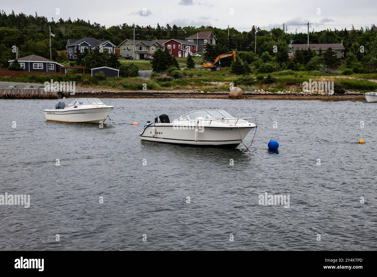 Boats anchored on Indian Pond in Seal Cove, Conception Bay South ...