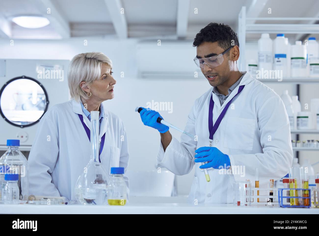 People, pipette and scientist with medical research, chemistry ...