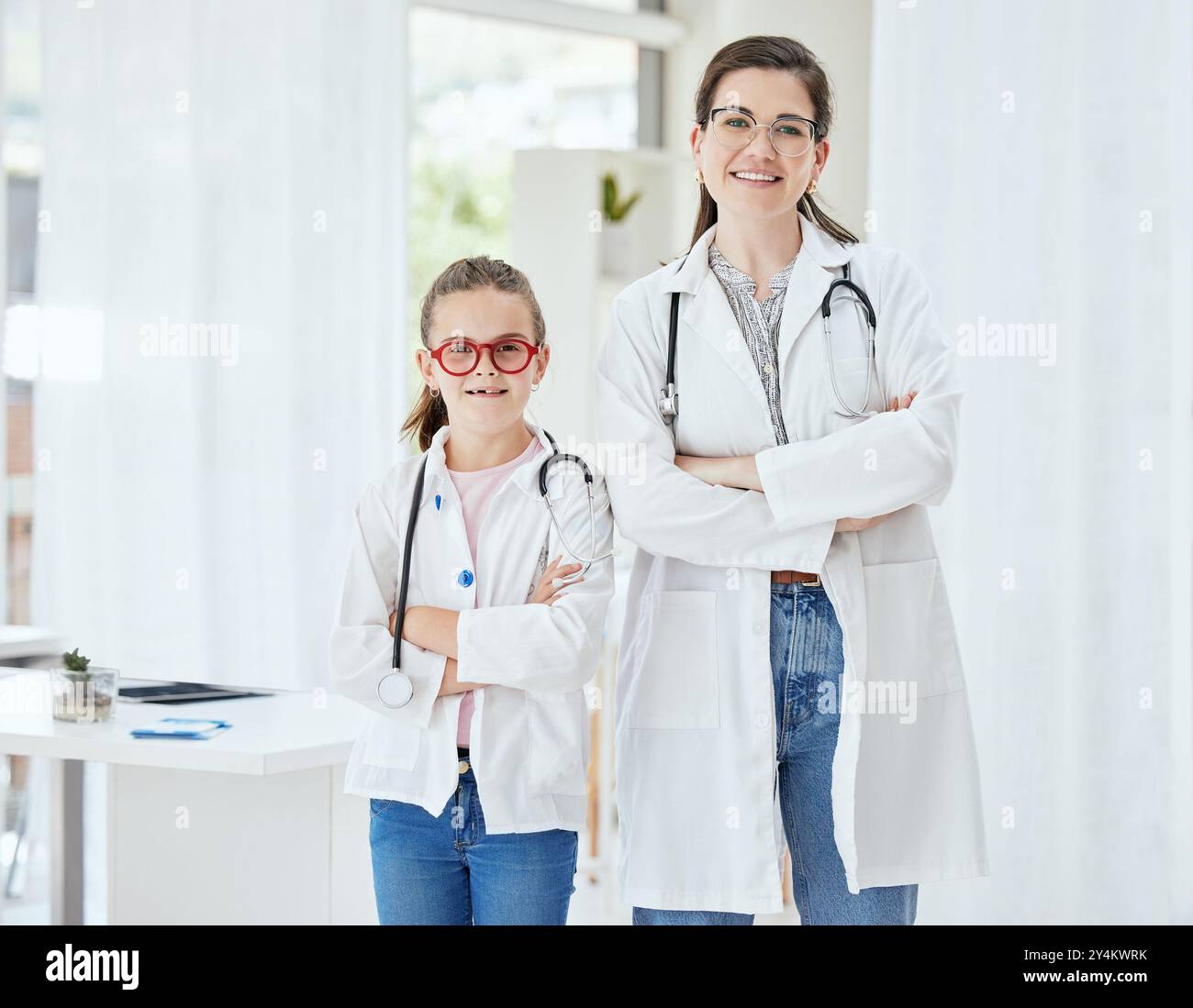 Doctor, portrait and child with costume in office for pretend play ...