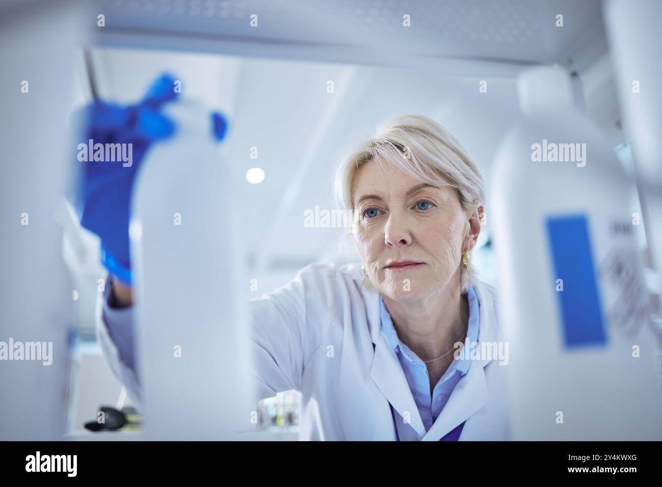 Mature scientist, product and medical research in science lab for chemistry experiment in ...