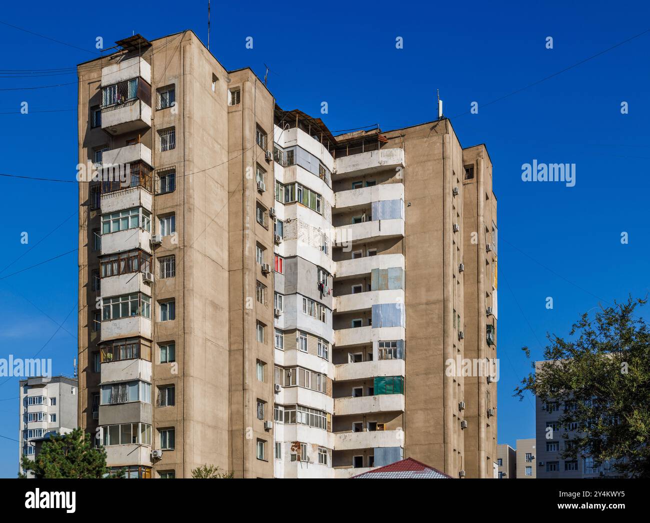 poor multistory apartment building at sunny day Stock Photo - Alamy
