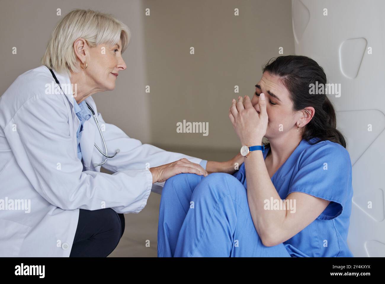 Nurse, crying and doctor comfort in hospital for medical mistake ...