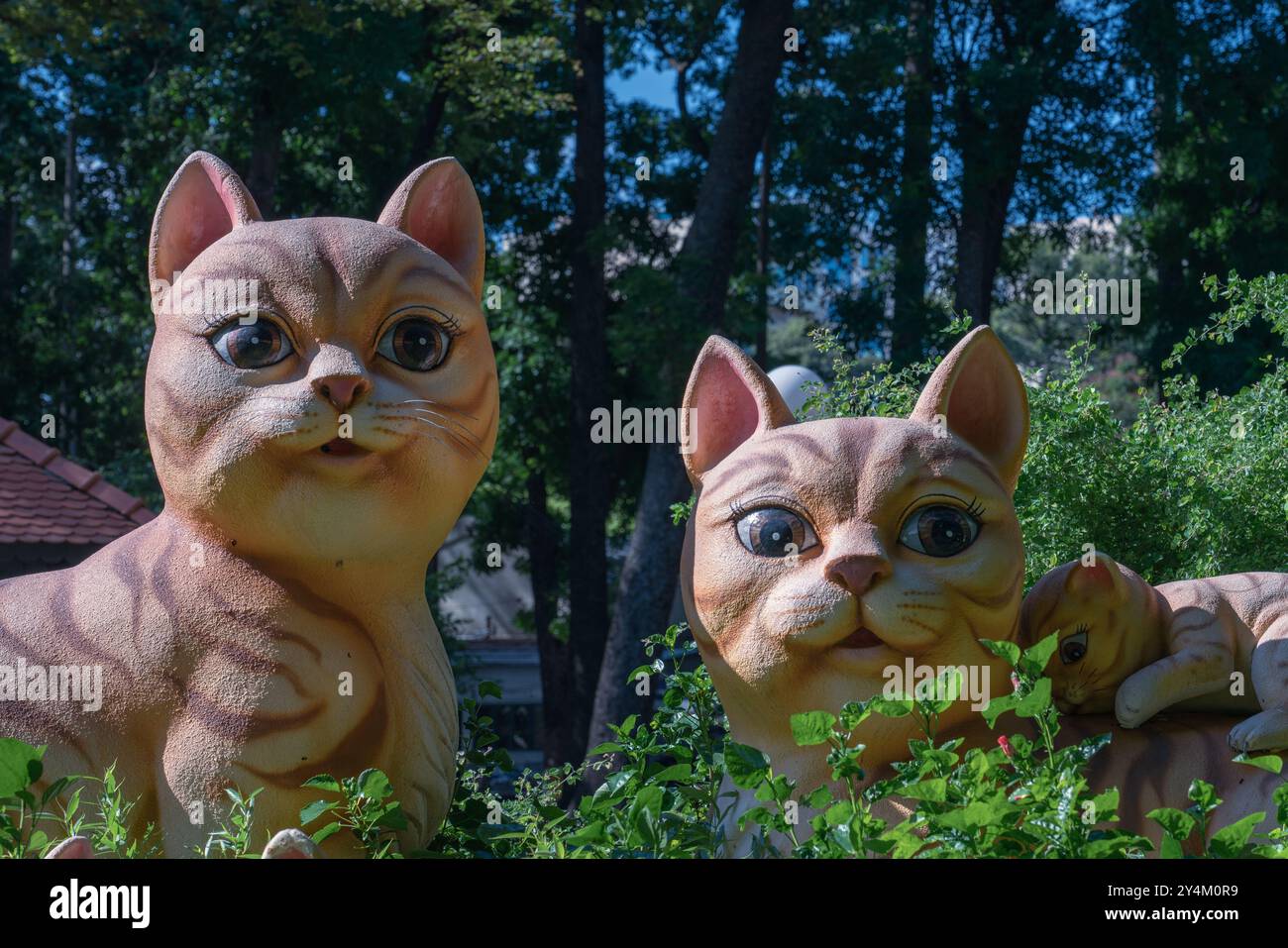 These are the cat statues at Tao Dan Park, a popular tourist ...