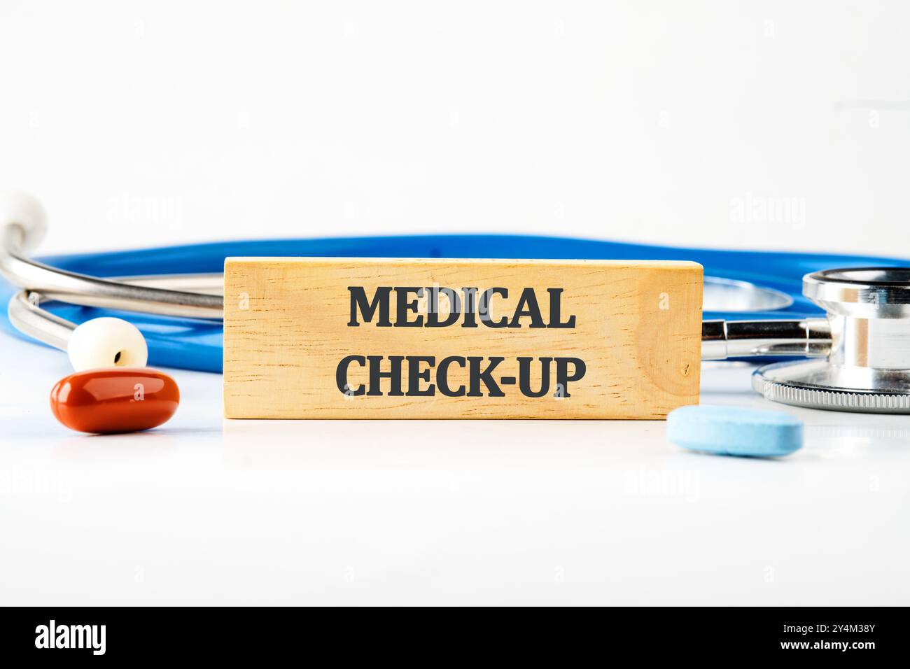 MEDICAL CHECK-UP words written on a wooden block. Front view Stock ...