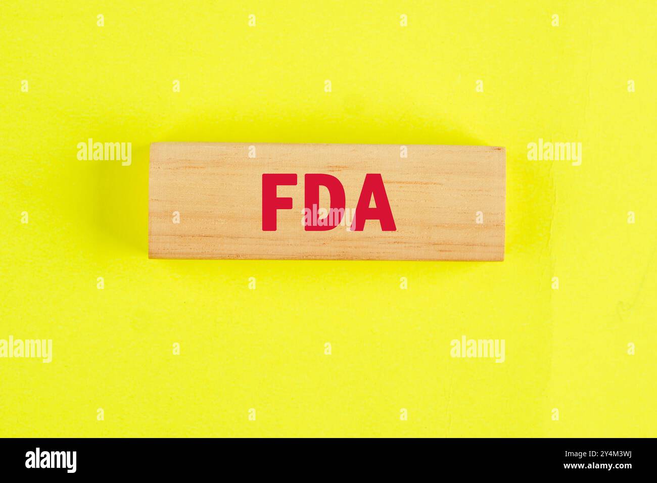 FDA Food and Drug Administration from wooden alphabet cubes on wooden ...