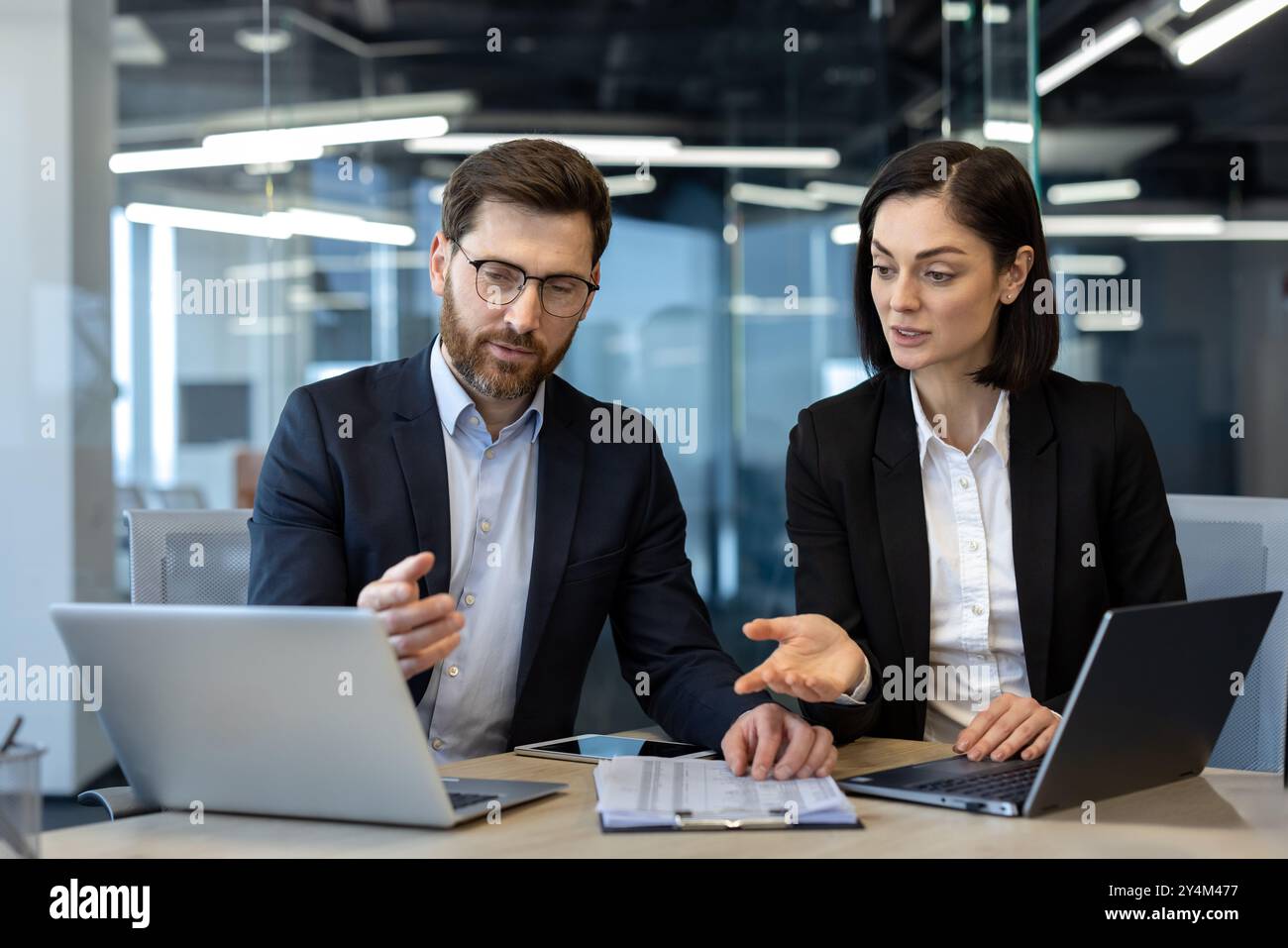 Professionals engage in collaborative discussion hi-res stock ...