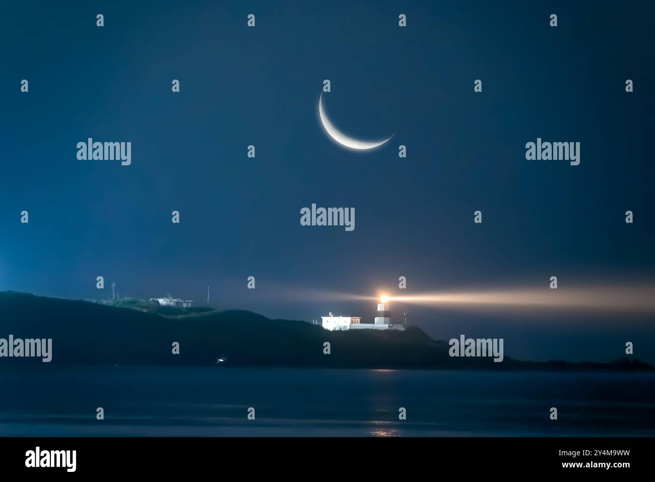 A crescent moon illuminates a serene night seascape, casting its gentle ...