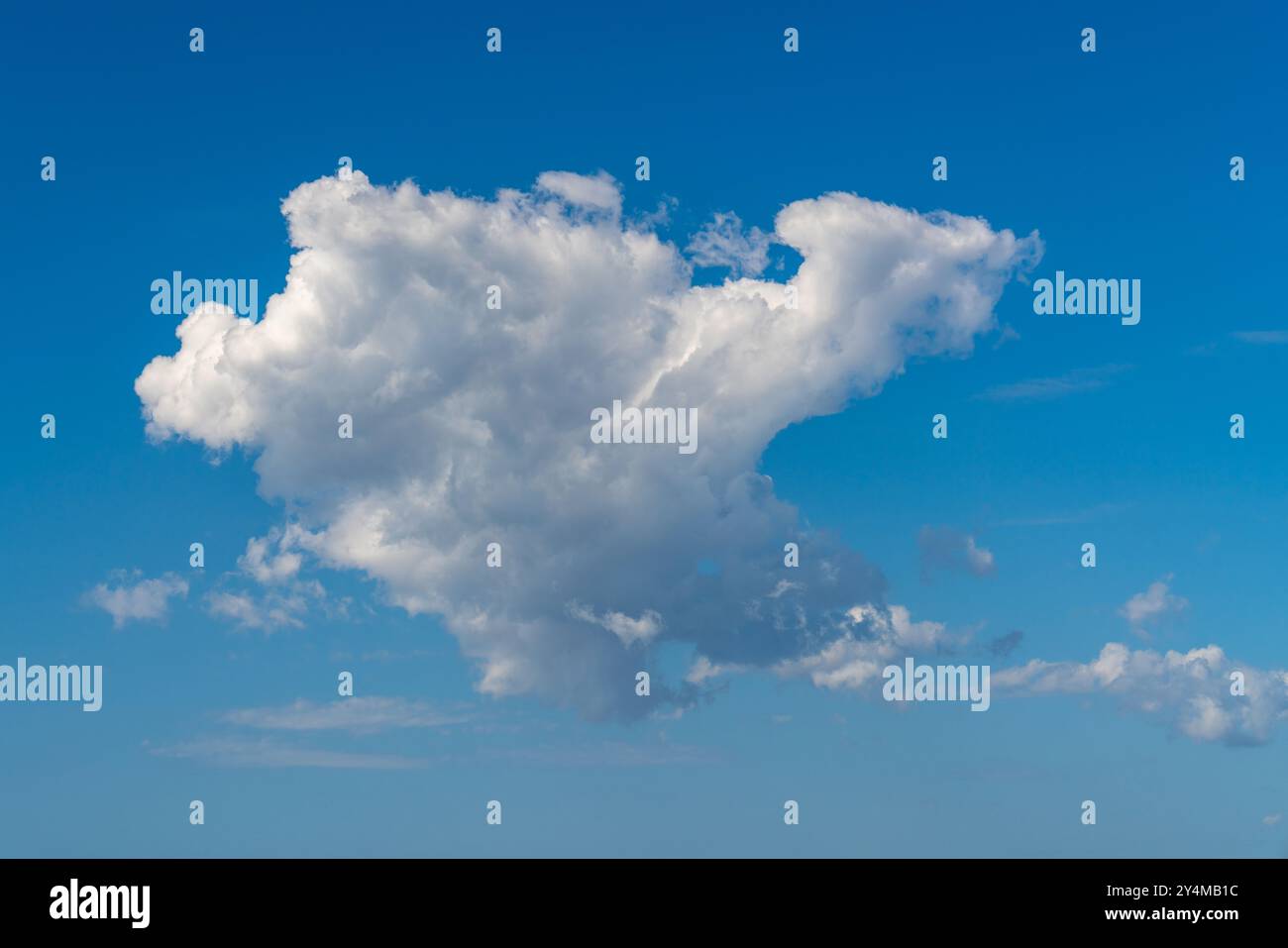 Huge cloud in blue sky with an unusual shape Stock Photo - Alamy