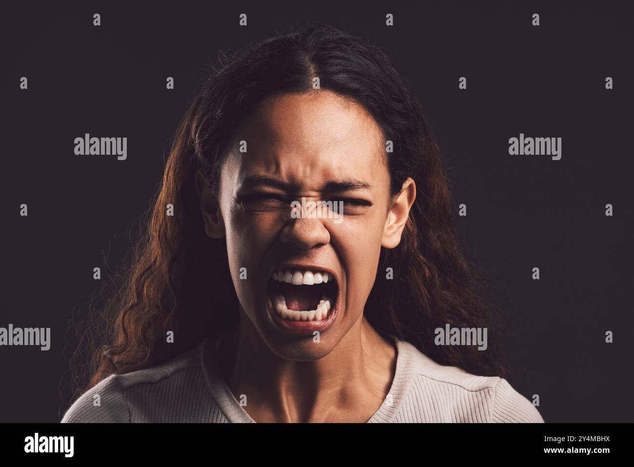 Angry woman, portrait and screaming with trauma for anxiety, stress or ...