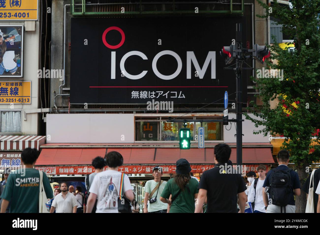 A billboard shows a logo of Icom, a Japanese wireless communication ...
